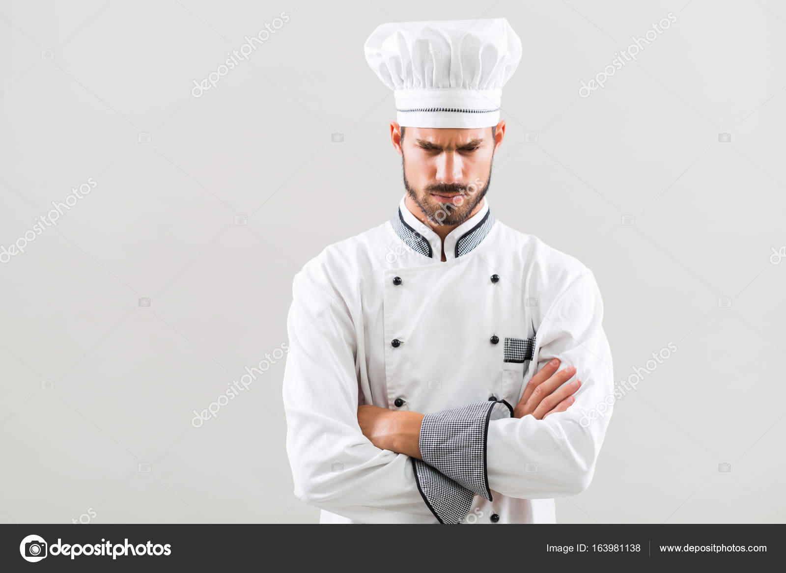 Angry chef on gray background. Stock Photo by ©inesbazdar 163981138