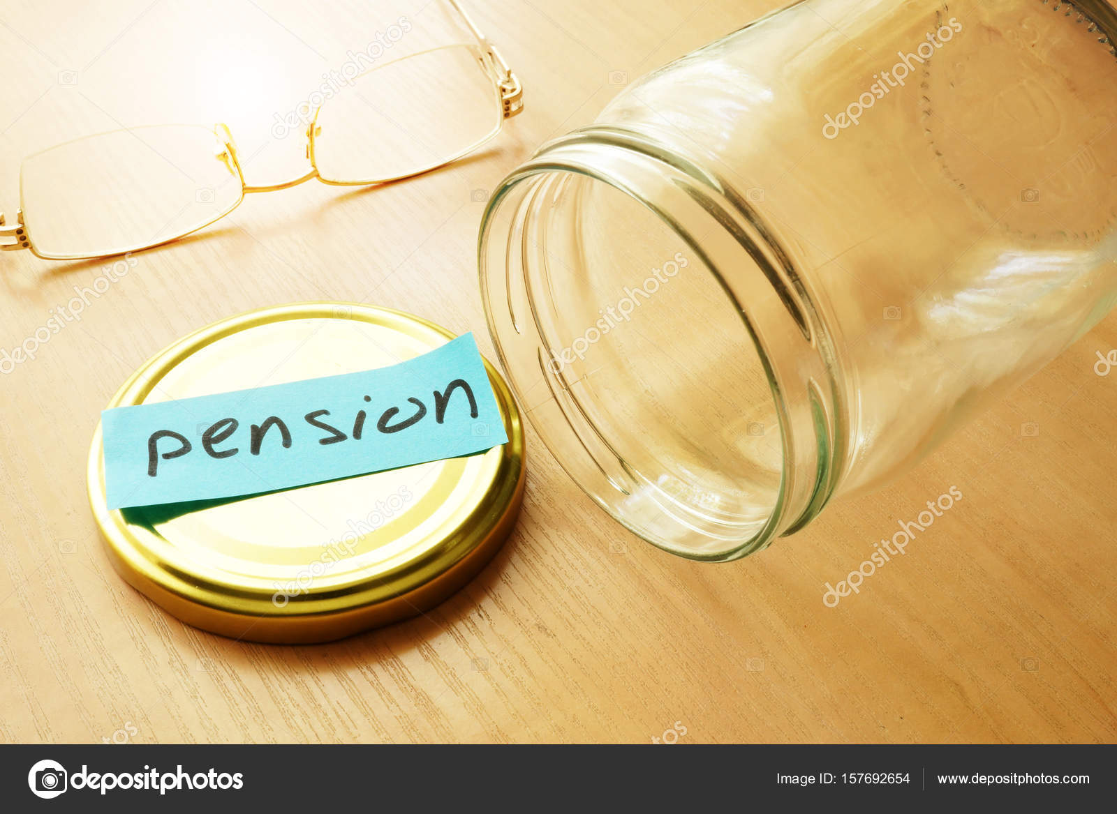 Empty jar with label pension. Retirement saving troubles concept ...