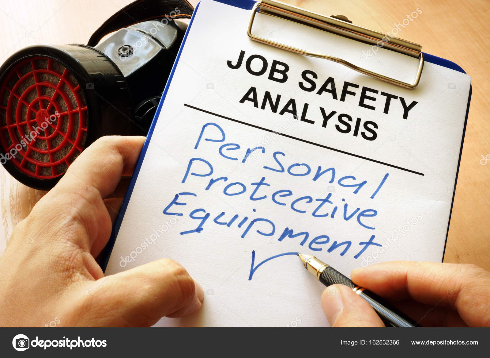 Man is writing words Personal protective equipment (PPE). Stock Photo ...
