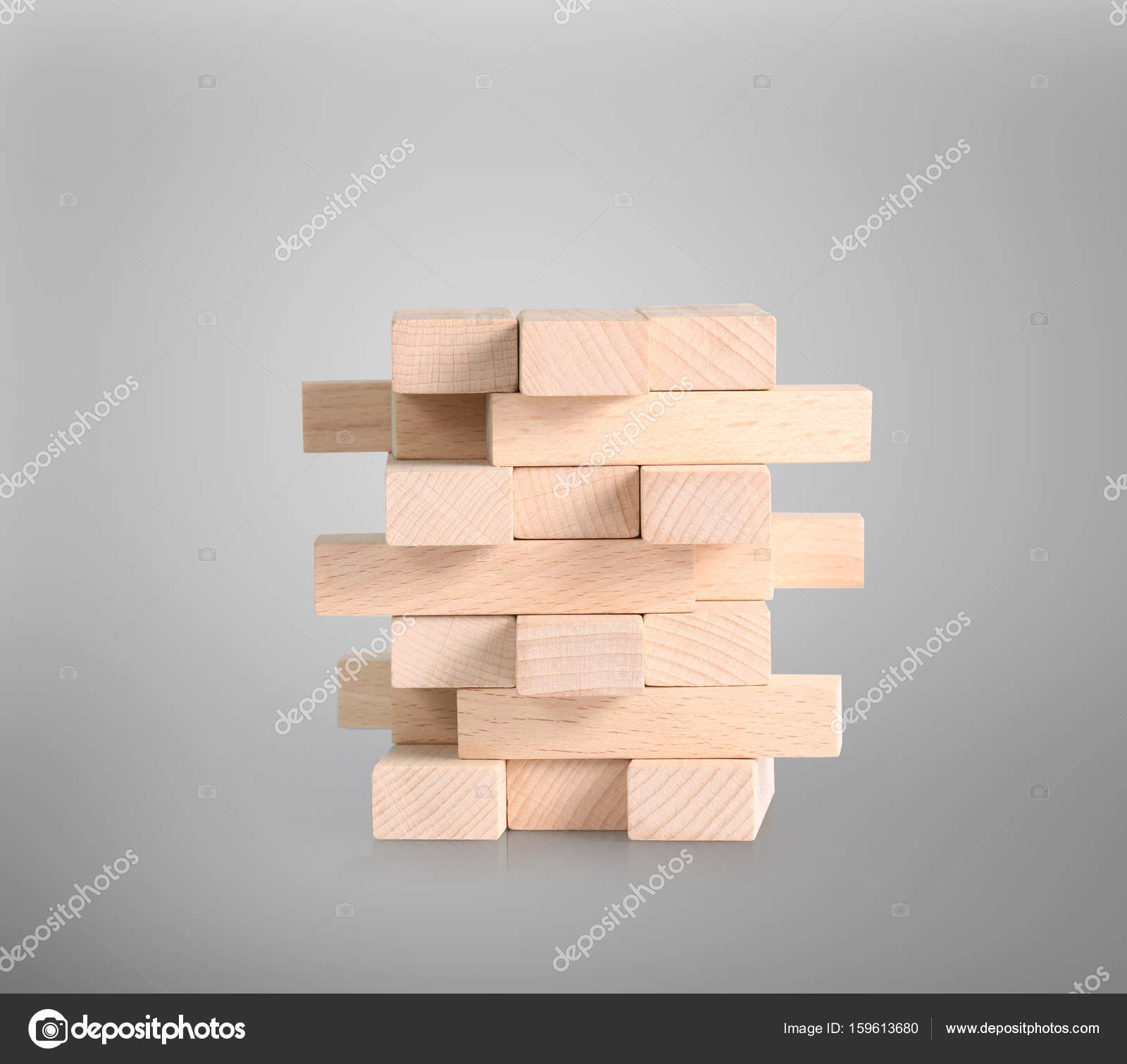 Playing wood blocks stack game Stock Photo by ©aeydenphumi 159613680