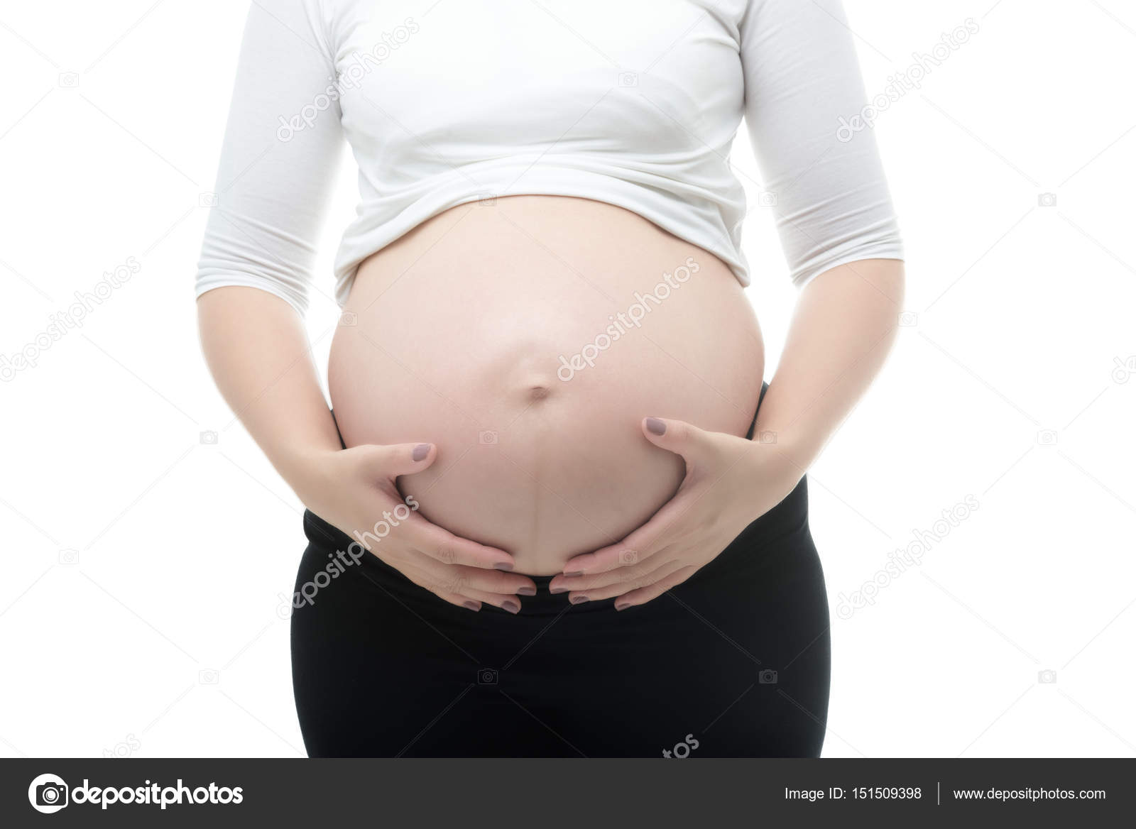 Mujer embarazada tocando su gran vientre — Foto de stock #151509398 © aha_x