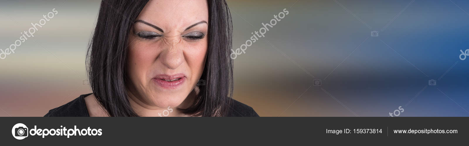 Young woman with an expression of disgust — Stock Photo © thodonal ...