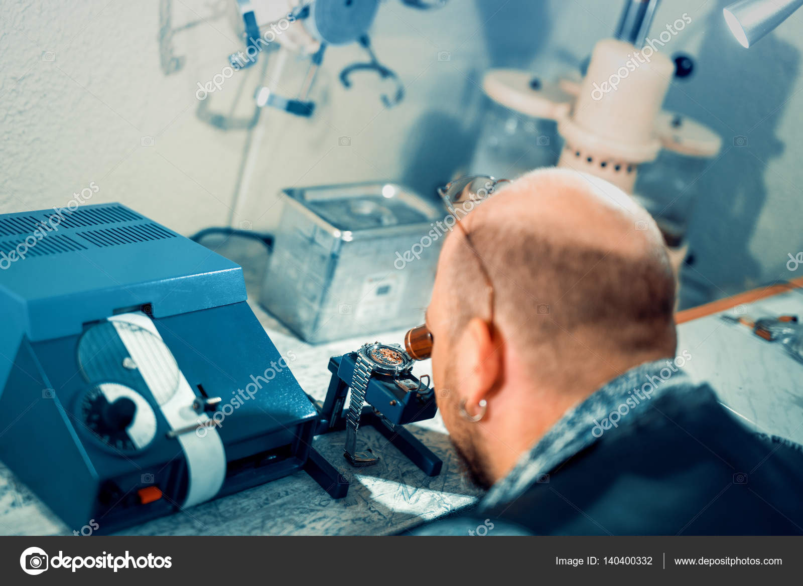 Close up portrait of a watchmaker at work — Stock Photo © Ivanko1980 ...