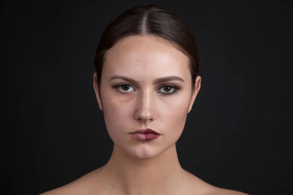 Woman with make-up on one side of the face and without make-up on the ...