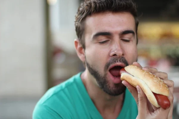 Man eating hot dog Stock Photos, Royalty Free Man eating hot dog Images ...