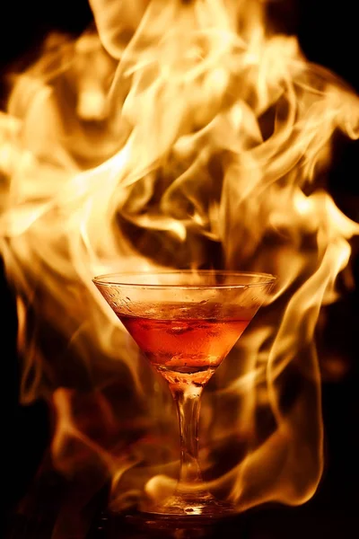 cocktail on fire. fiery cocktail. fire on the bar - Stock Image ...