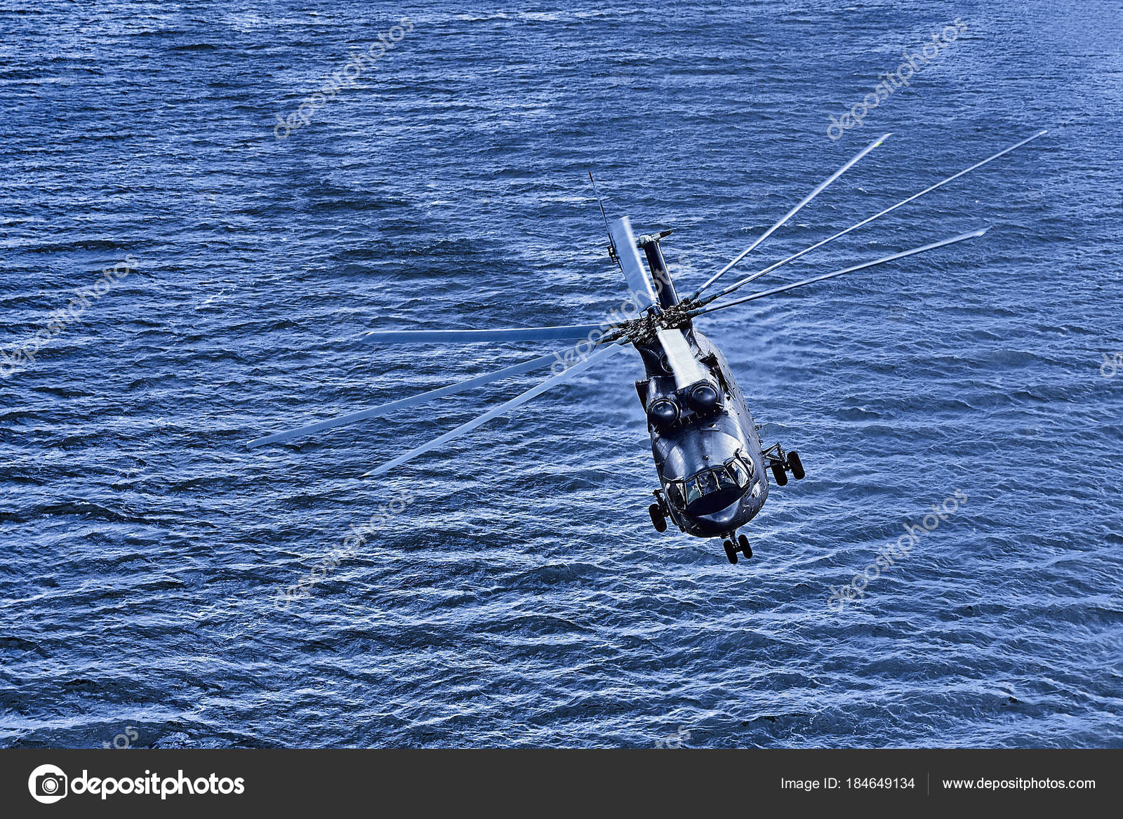 Transport helicopter hovered over the water. Mi-26 T2 in flight — Stock Editorial Photo ...