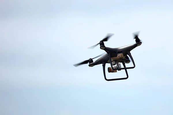 DJI Phantom 4 Pro Obsidian Edition in flight. – Stock Editorial Photo ...