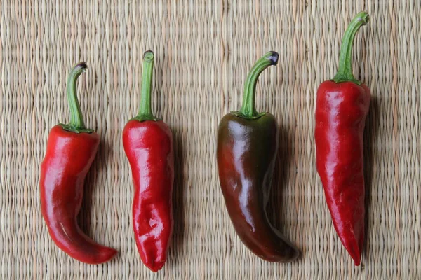 Red hot chili peppers on a table - Stock Image - Everypixel