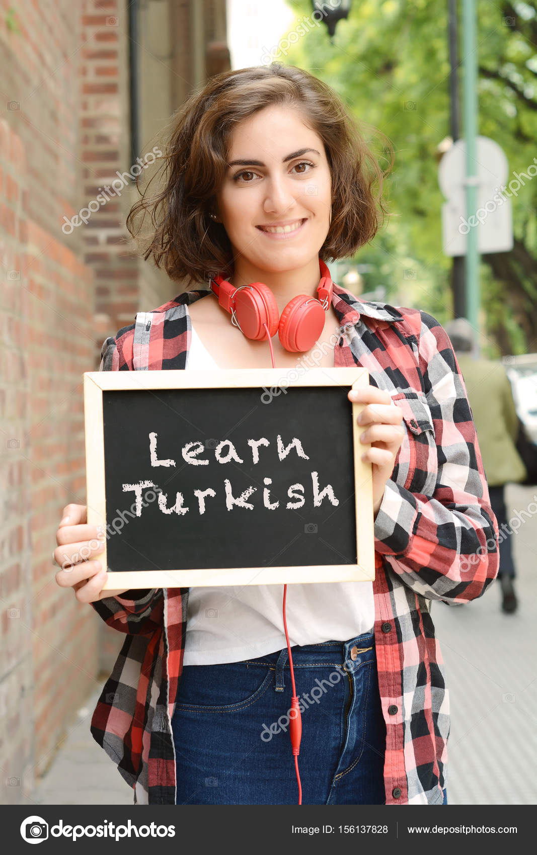 Woman holding chalkboard with text "learn turkish". — Stock Photo ...