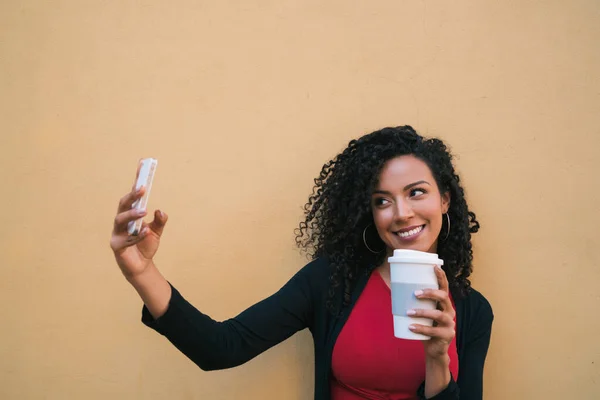 Portrait Young Afro Woman Taking Selfies Her Mophile Phone Yellow Stock