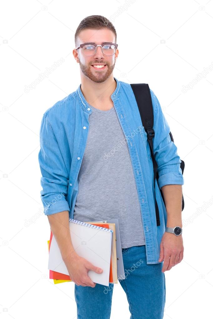 A male student with a school bag holding books isolated on white ...