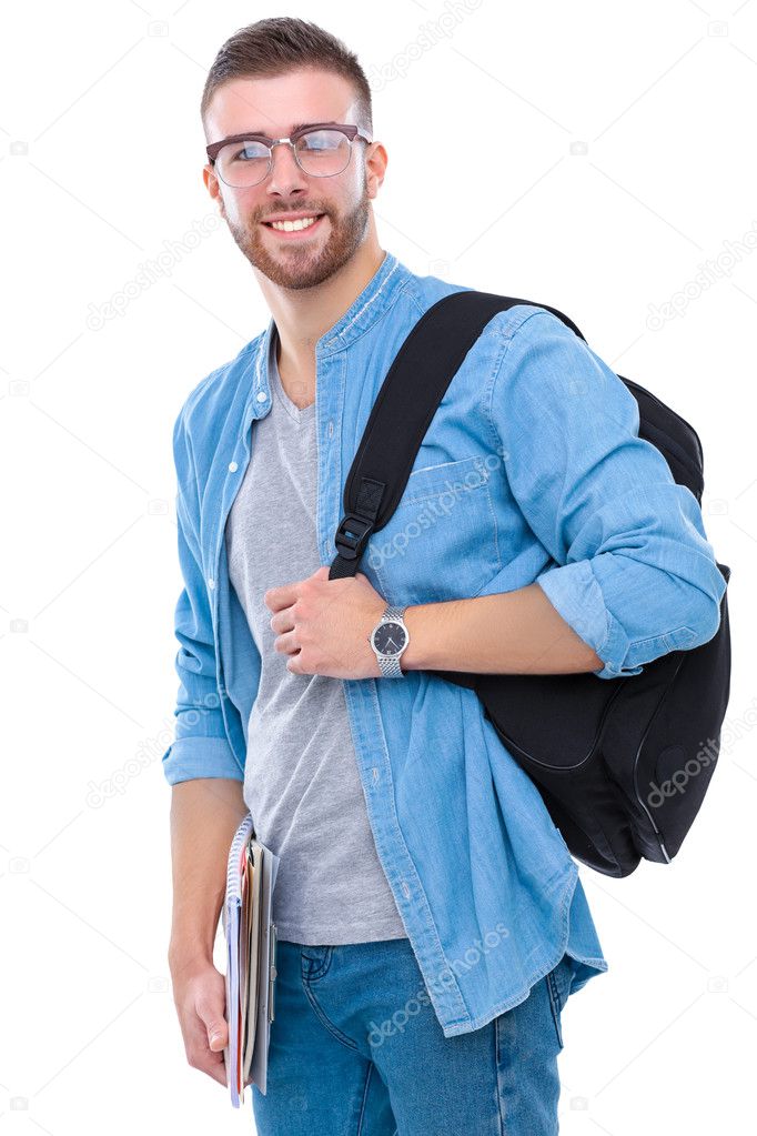 A male student with a school bag holding books isolated on white ...