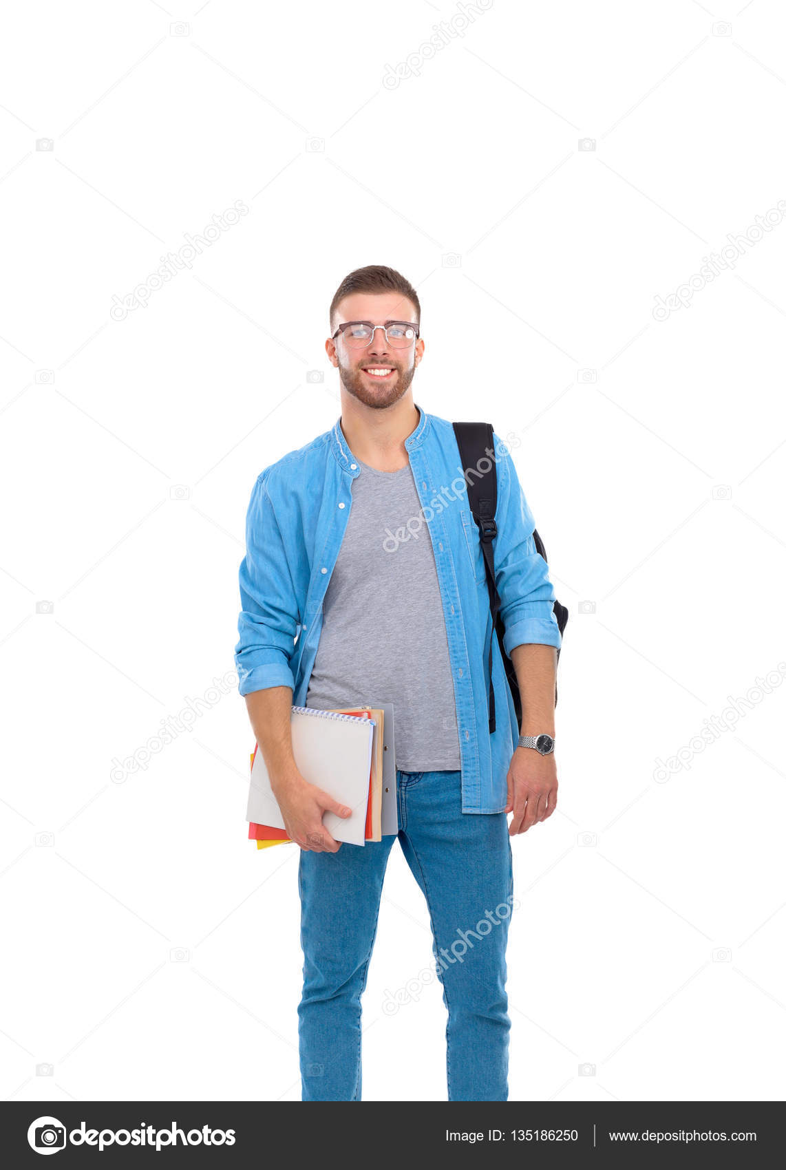 Male student with a school bag holding books isolated on white ...