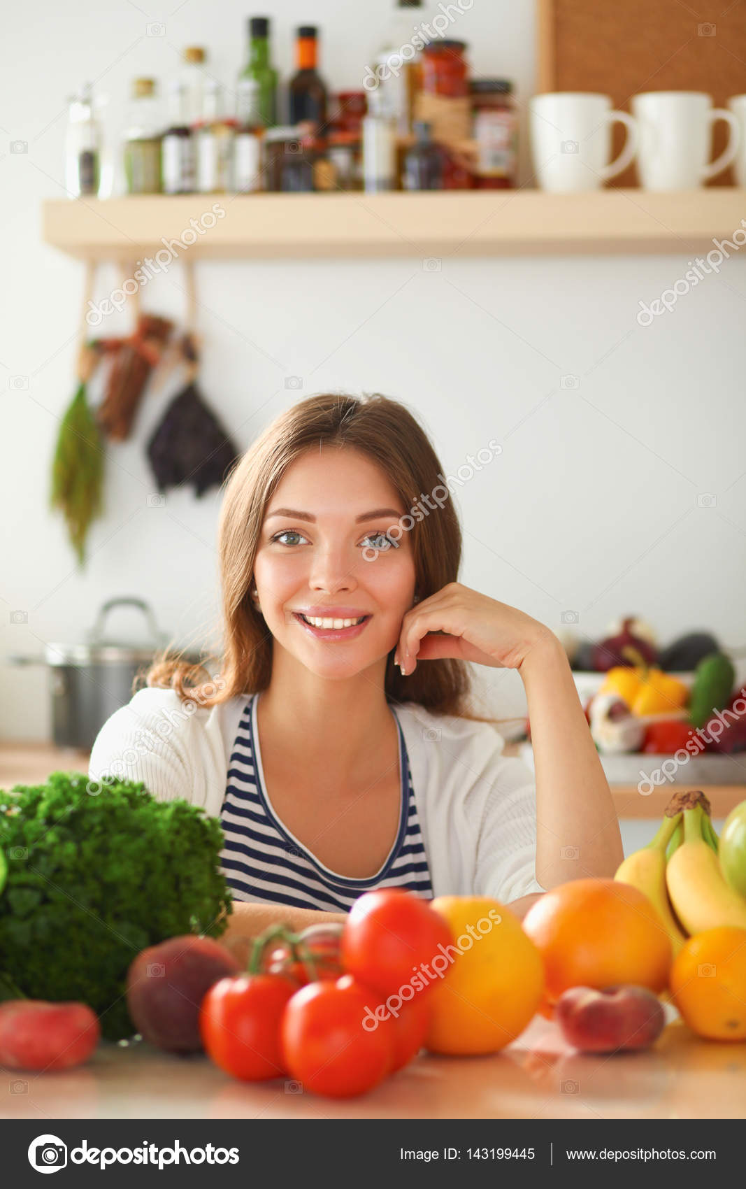 Young woman standing near desk in the kitchen Stock Photo by ©Lenets ... Young woman standing near desk in the kitchen Stock Photo by ©Lenets ...