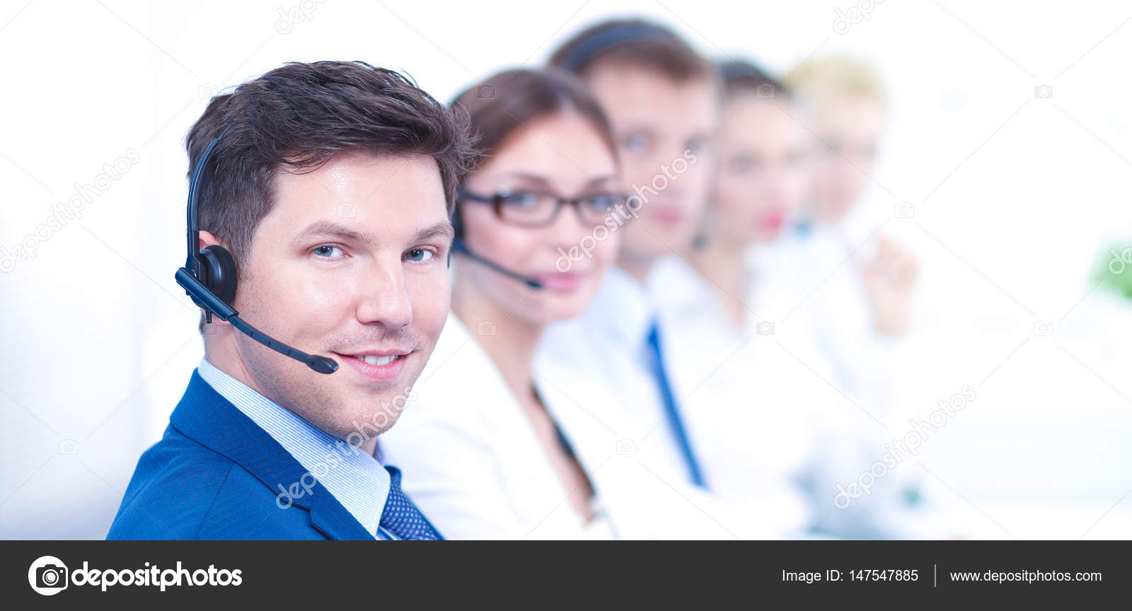 Attractive Smiling positive young businesspeople and colleagues in a ... Attractive Smiling positive young businesspeople and colleagues in a ...