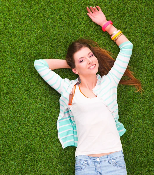 Top view of beautiful young woman holding hands behind head - Stock ...