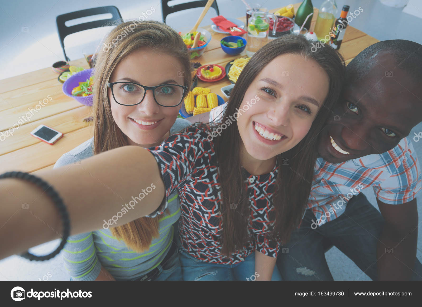 Group of people doing selfie during lunch. Self. Friends. Friends are ...