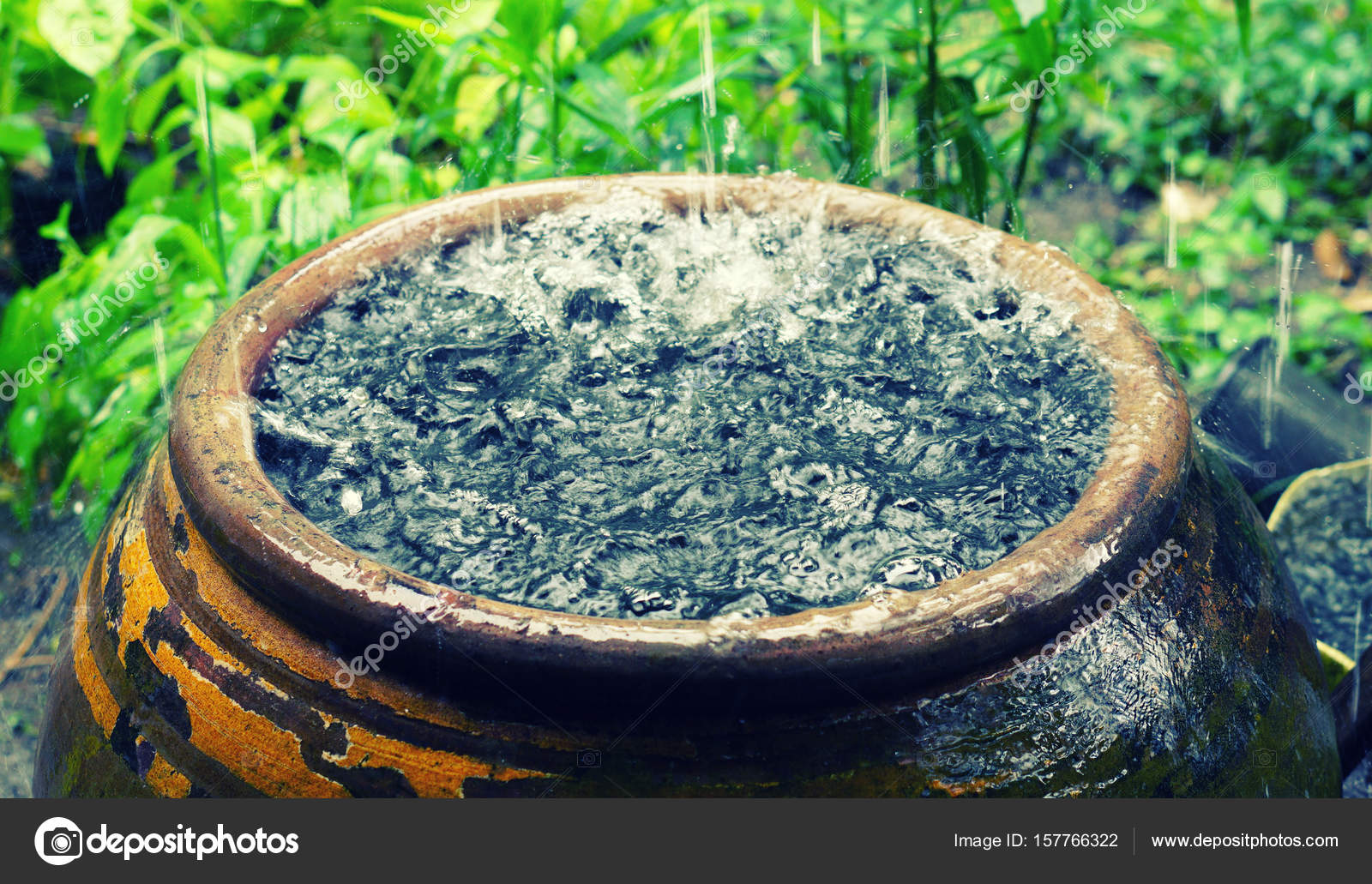 Rain Falling Jar — Stock Photo © kikkalek #157766322