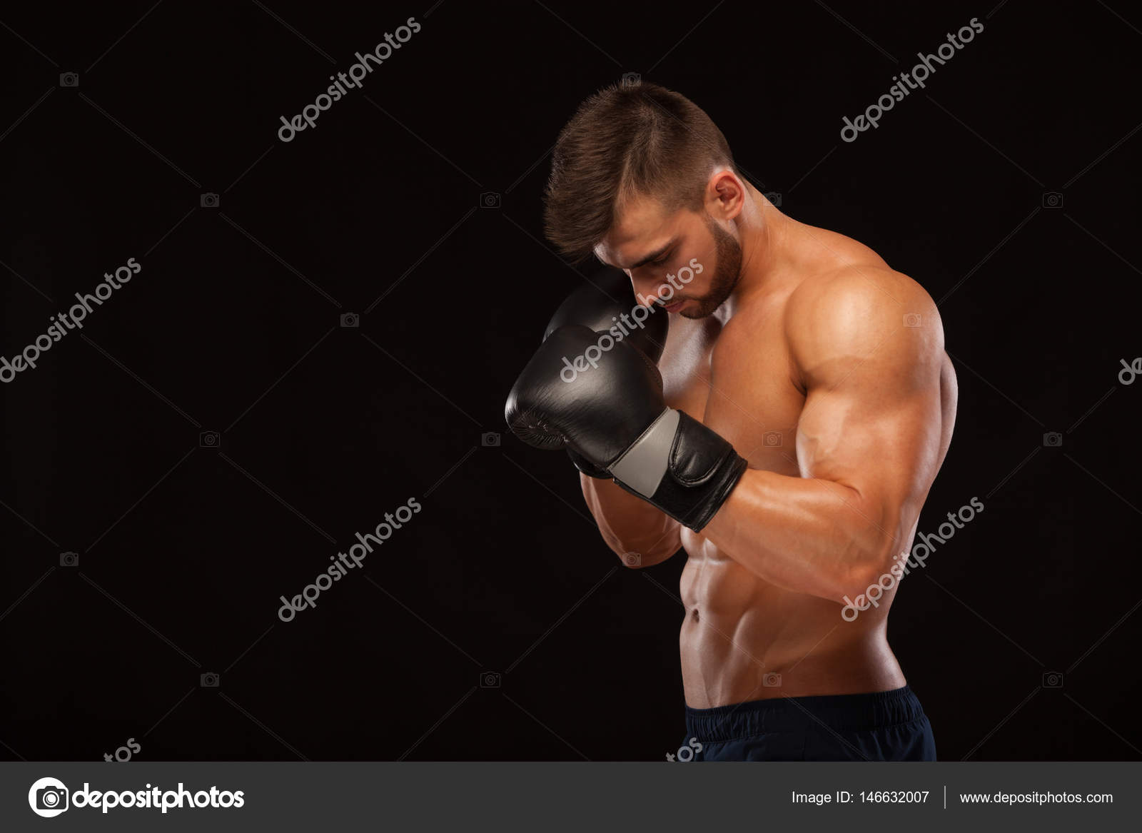 Muscular young man with perfect Torso with six pack abs, in boxing ...