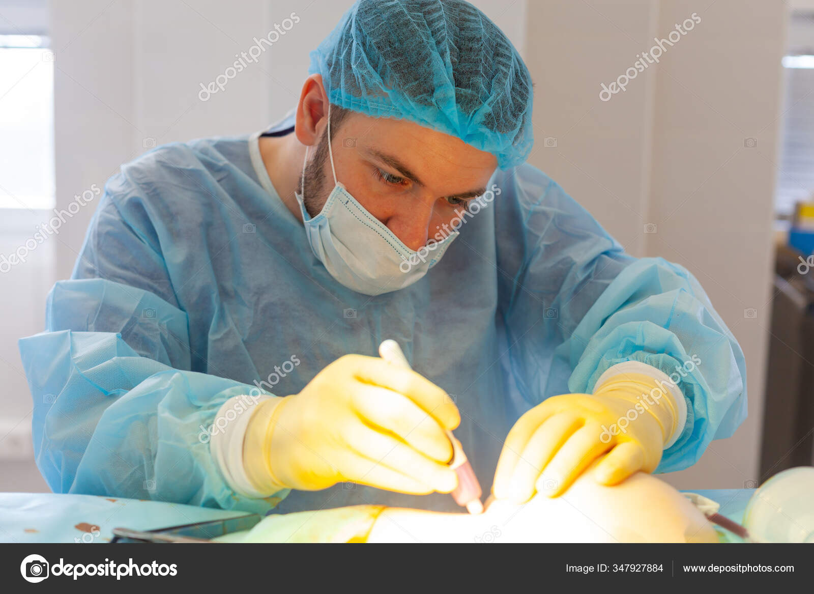 Hospital. Surgeon operates in the operating room. The doctor uses the ...