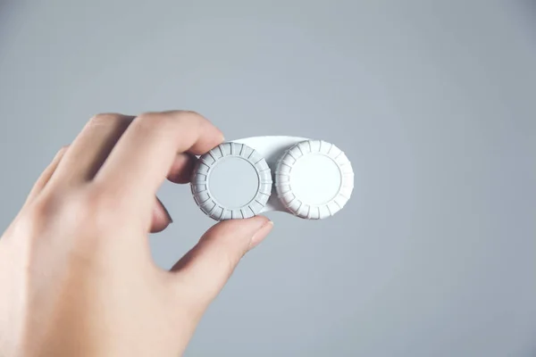 Woman Hand Optice Lenses Grey Background — Stock Photo © Aghavni #375228528