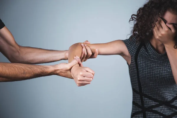 Angry Man Beat Sad Woman Gray Background Stock Photo by ©Aghavni 370249736