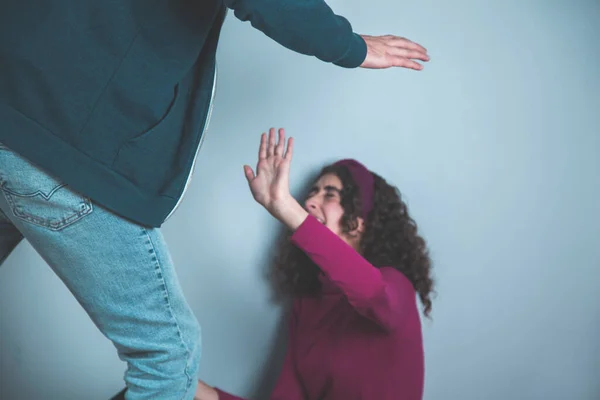 Angry Man Beat Sad Woman Gray Background Stock Photo by ©Aghavni 370249736