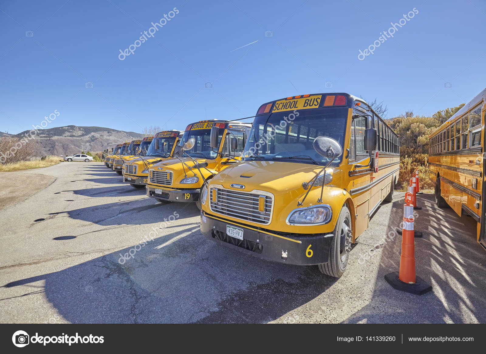 School buses parked on the outskirts of the city. – Stock Editorial ...