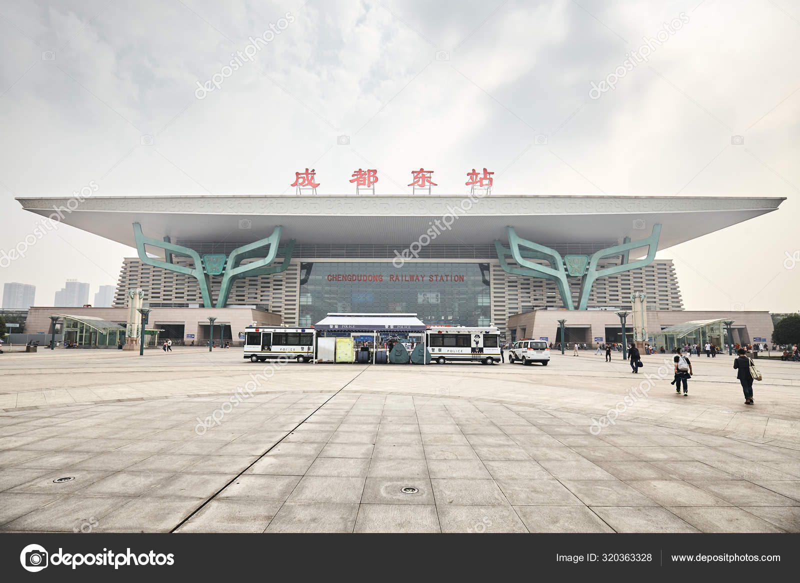 Police mobile force in front of Chengdu railway station modern building ...