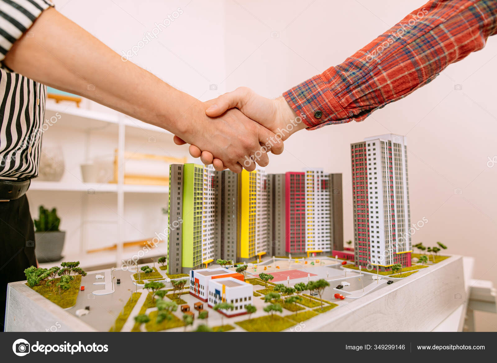 Two builders architects shaking hands — Stock Photo © romanchazov27 ...