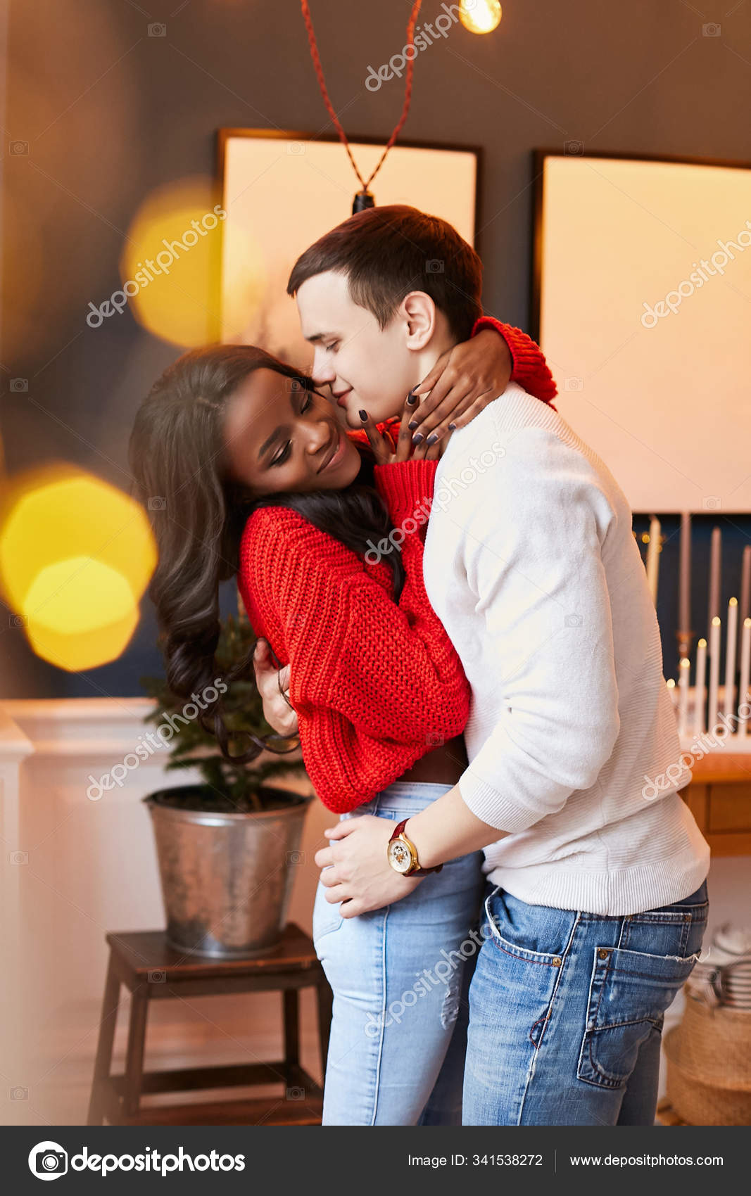 Newlyweds during the celebration of Valentine's Day. The guy hugs the ...
