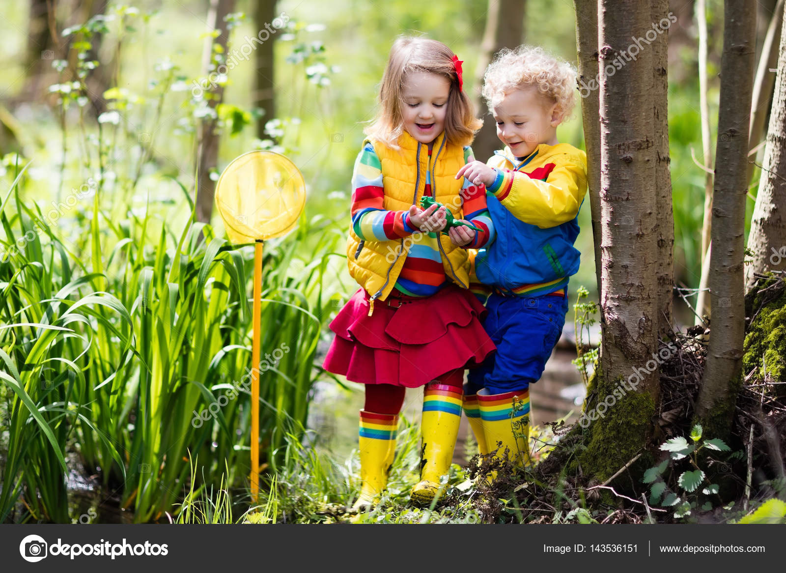 Children playing outdoors catching frog — Stock Photo © FamVeldman ...