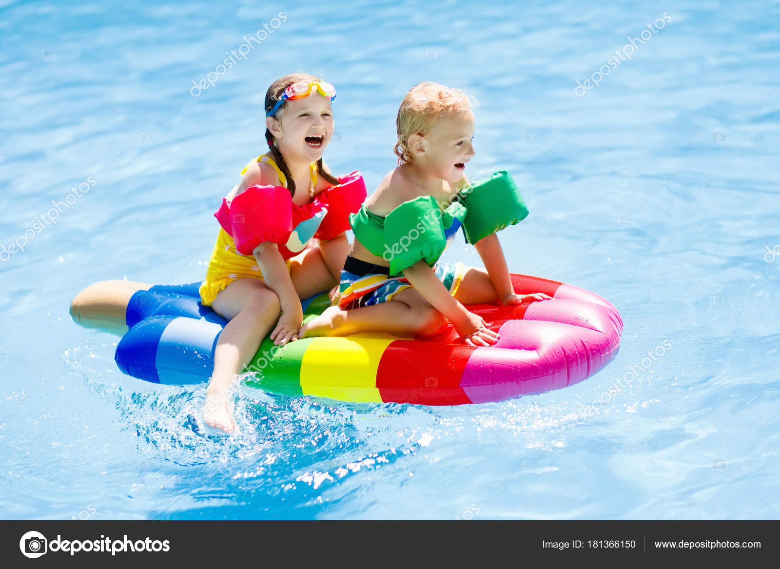 Kids on inflatable float in swimming pool. Stock Photo by ©FamVeldman ...