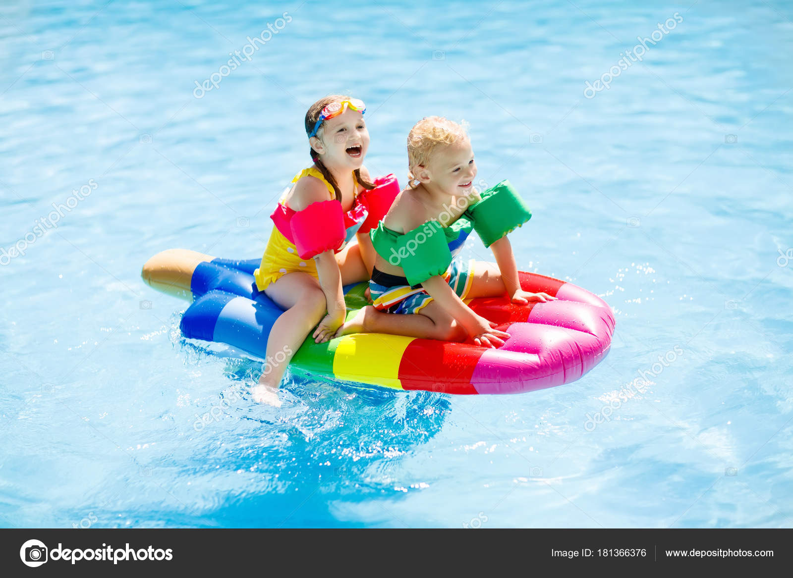Kids on inflatable float in swimming pool. Stock Photo by ©FamVeldman ...