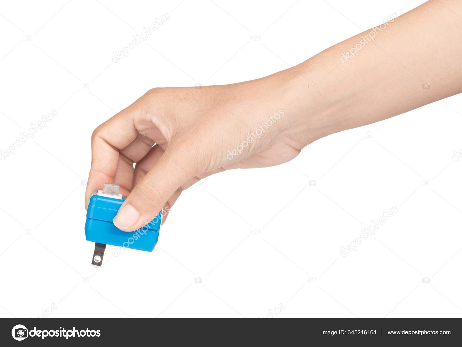 Hand holding Electric energy adapter used to split socket outlet ...