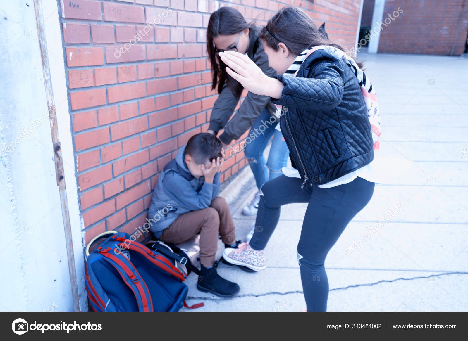 Schoolyard bullies, concept of this taking place after school ...
