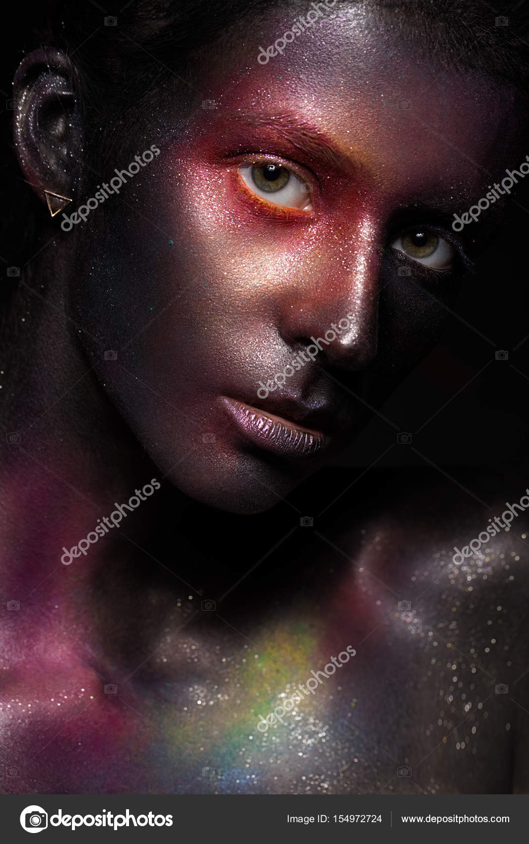 Beautiful girl with art space makeup on her face and body. Glitter Face ...