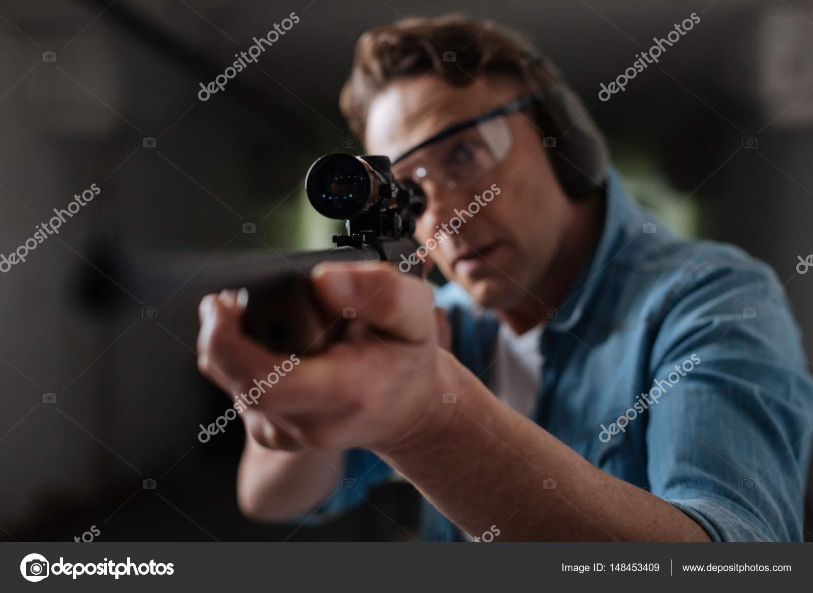 Handsome professional sniper looking into the optical sight — Stock ...