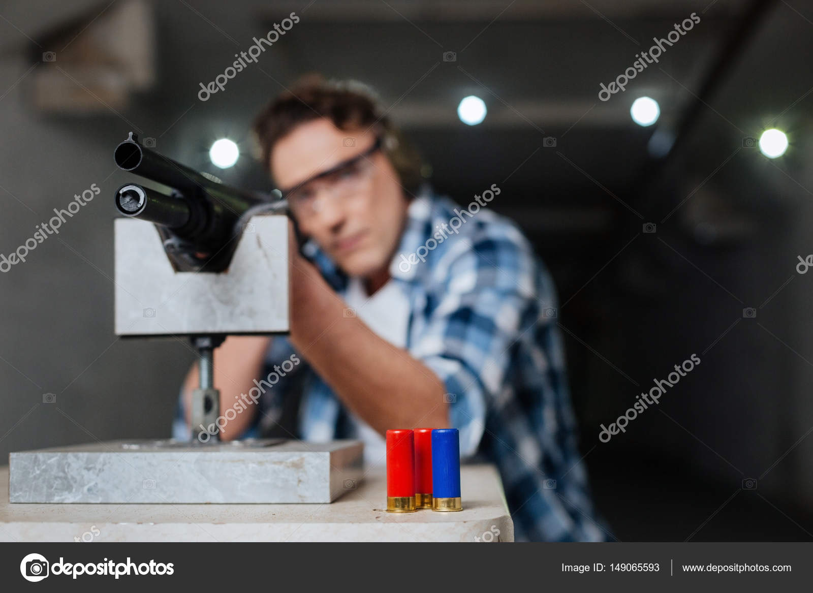 Three rifle bullets standing on the table Stock Photo by ©yacobchuk1 ...