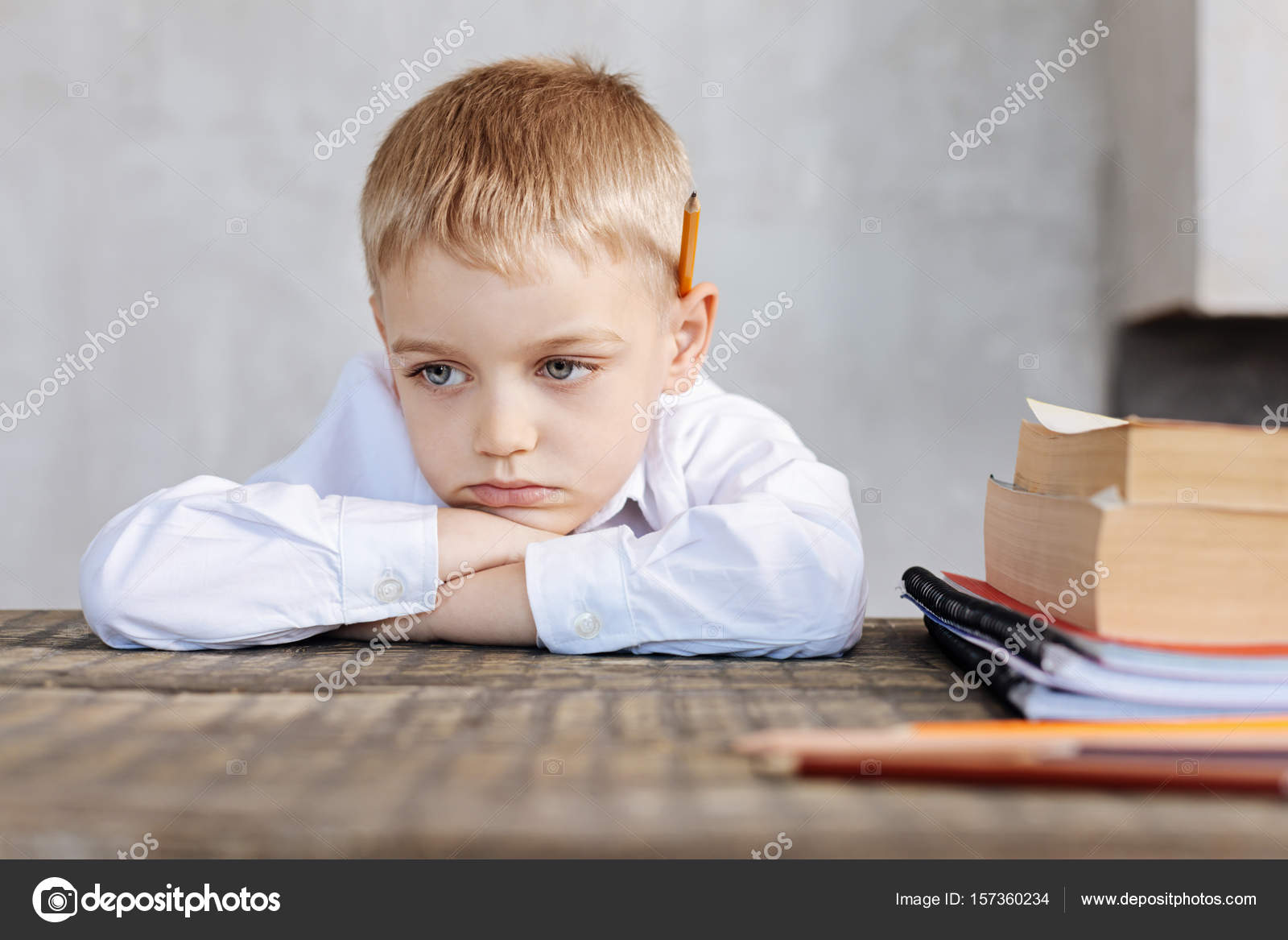 Sad sincere boy being a stubborn student — Stock Photo © yacobchuk1 ...