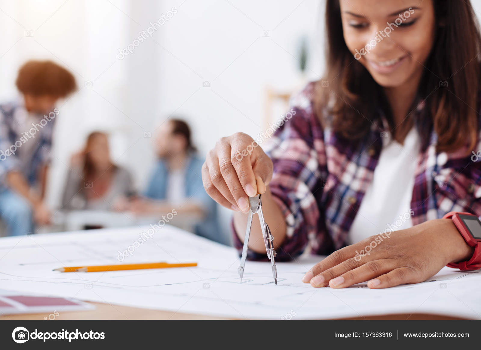 Smart architect being very precise while measuring distances Stock ...