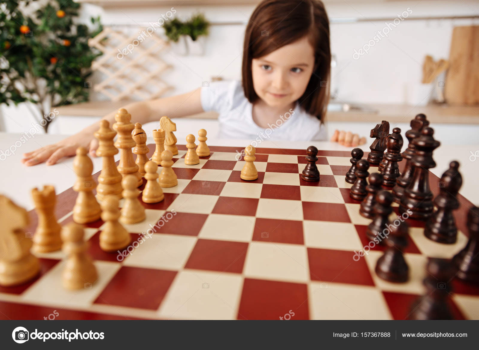 Little girl changing a perspective on a chessboard — Stock Photo ...