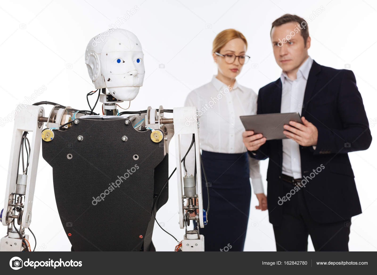 Progressive dedicated inventors testing innovative mechanisms — Stock ...