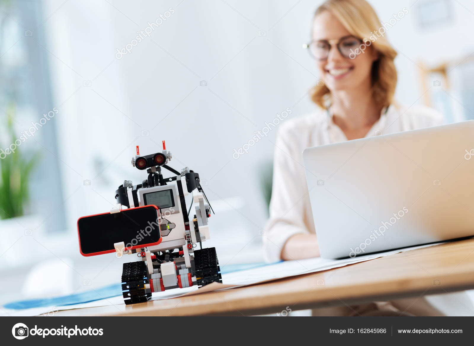 Self automated robot helping the inventor indoors — Stock Photo ...