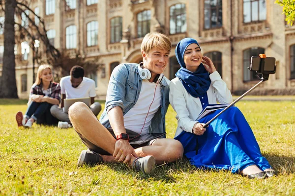 Open minded confident friends posing for a picture - Stock Image ...