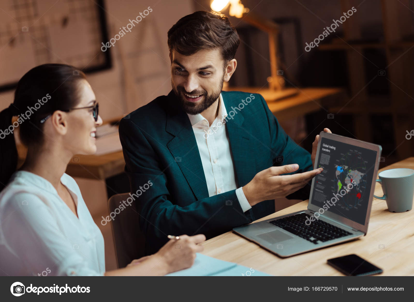 Positive assistant making important notes Stock Photo by ©yacobchuk1 ...