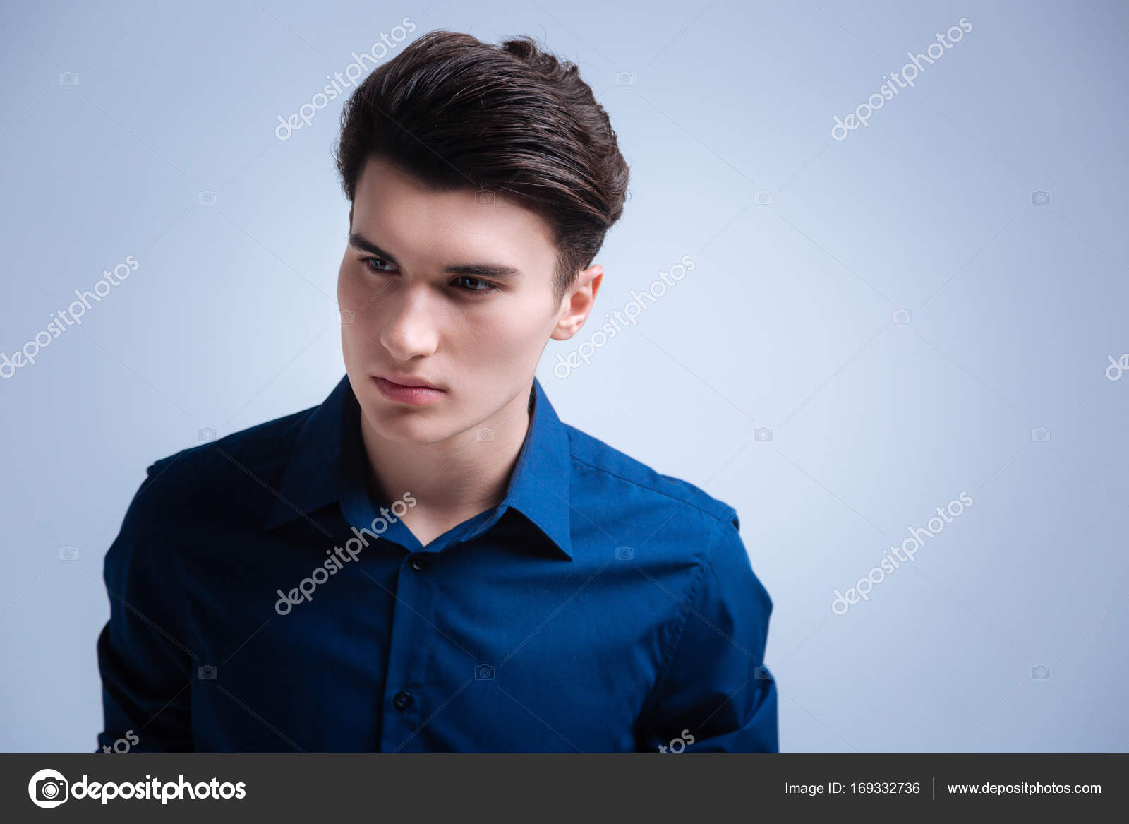 Handsome young man looking sideways Stock Photo by ©yacobchuk1 169332736 Handsome young man looking sideways Stock Photo by ©yacobchuk1 169332736
