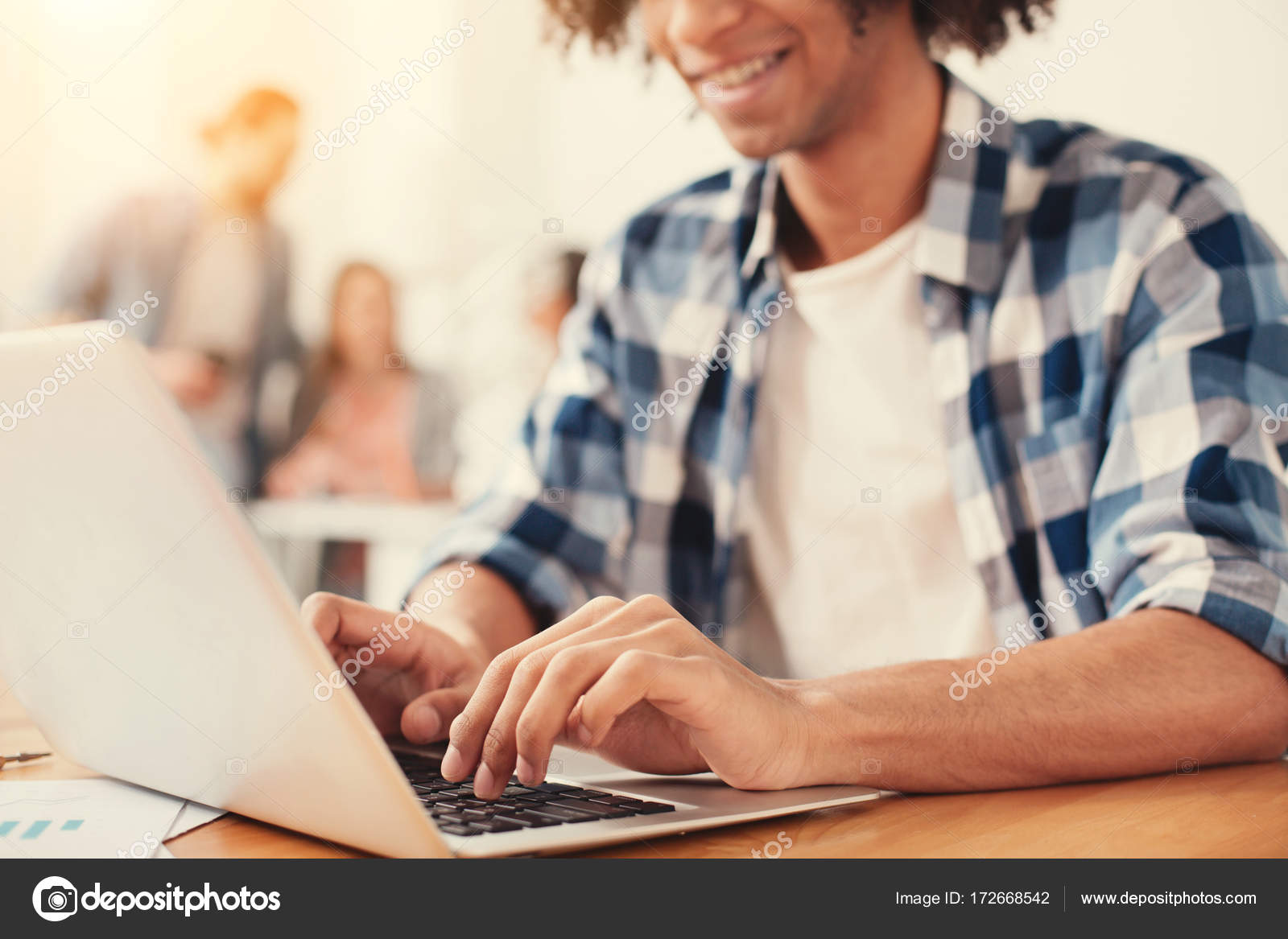 Smiling student typing a report on a laptop Stock Photo by ©yacobchuk1 ...