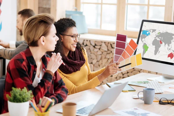 Content woman discussing work with her co-worker - Stock Image - Everypixel